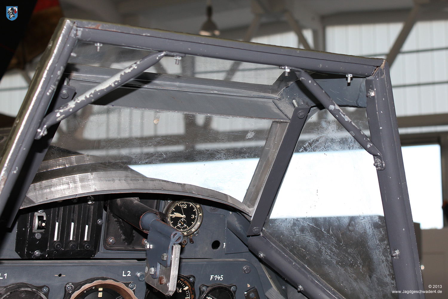 A member of the RAF holds up a bulletproof window from a captured ...